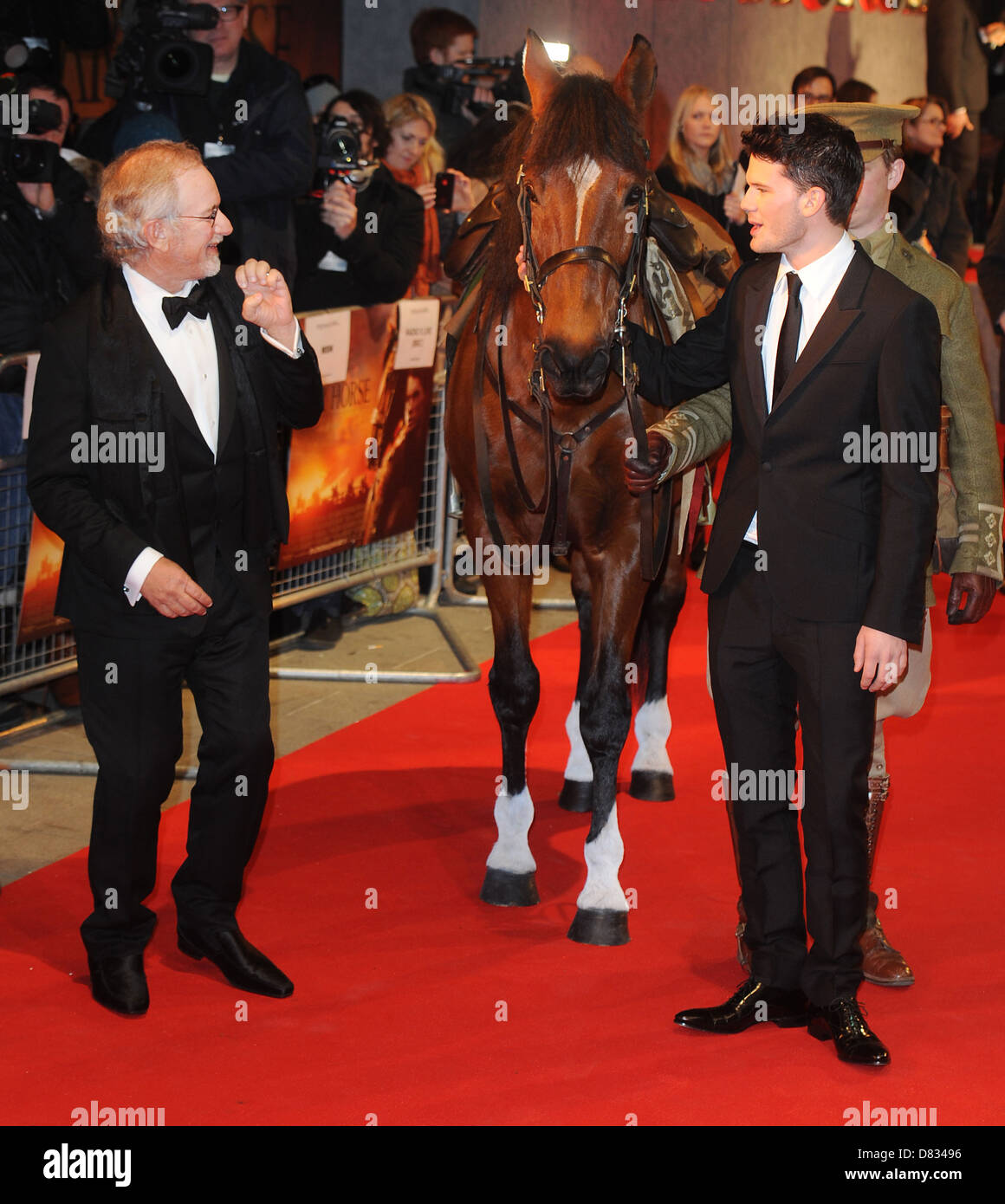 Steven Spielberg and Jeremy Irvine at the premiere of War Horse at ...
