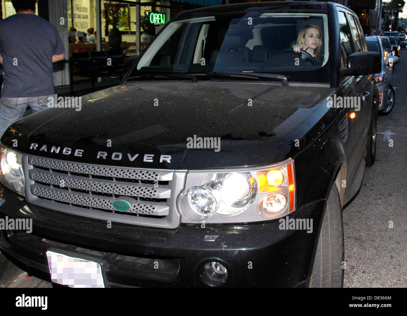 Emma Roberts driving her Range Rover in Beverly Hills Los Angeles ...