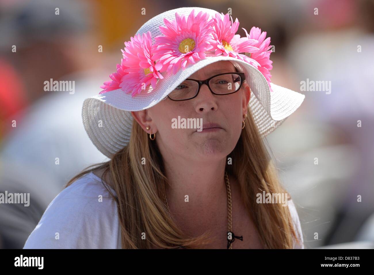 Baltimore, Maryland, USA. 17th May 2013. A horse racing fan wears a ...