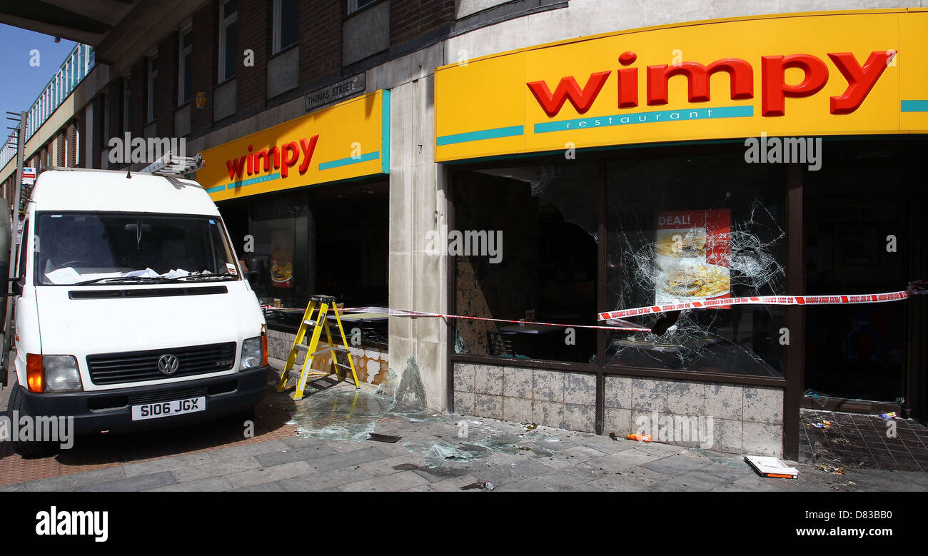 The aftermath of rioting in Woolwich, England on August 8, 2011 Police ...