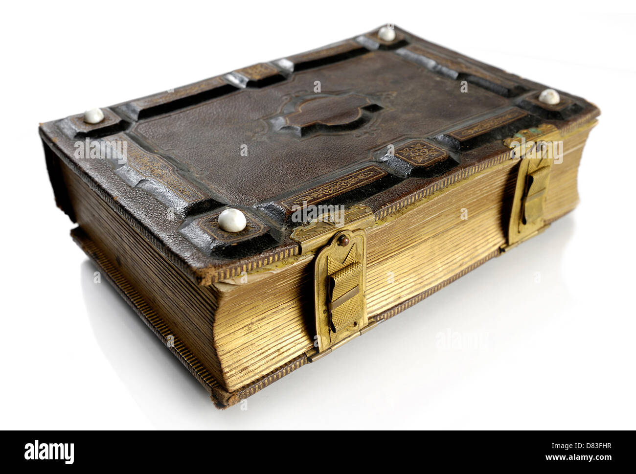 Closeup of rustic ancient book photo album with hard ornamental leather ...