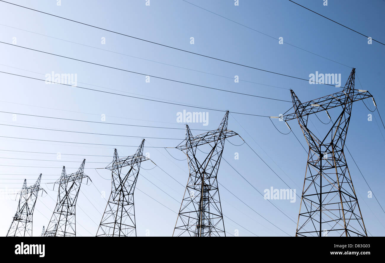 Power lines over blue sky background. Ontario, Canada Stock Photo - Alamy