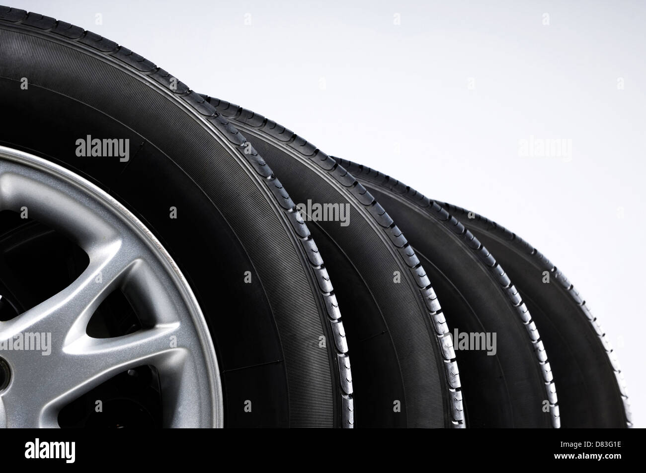 Set of all-season tires isolated on white background Stock Photo - Alamy