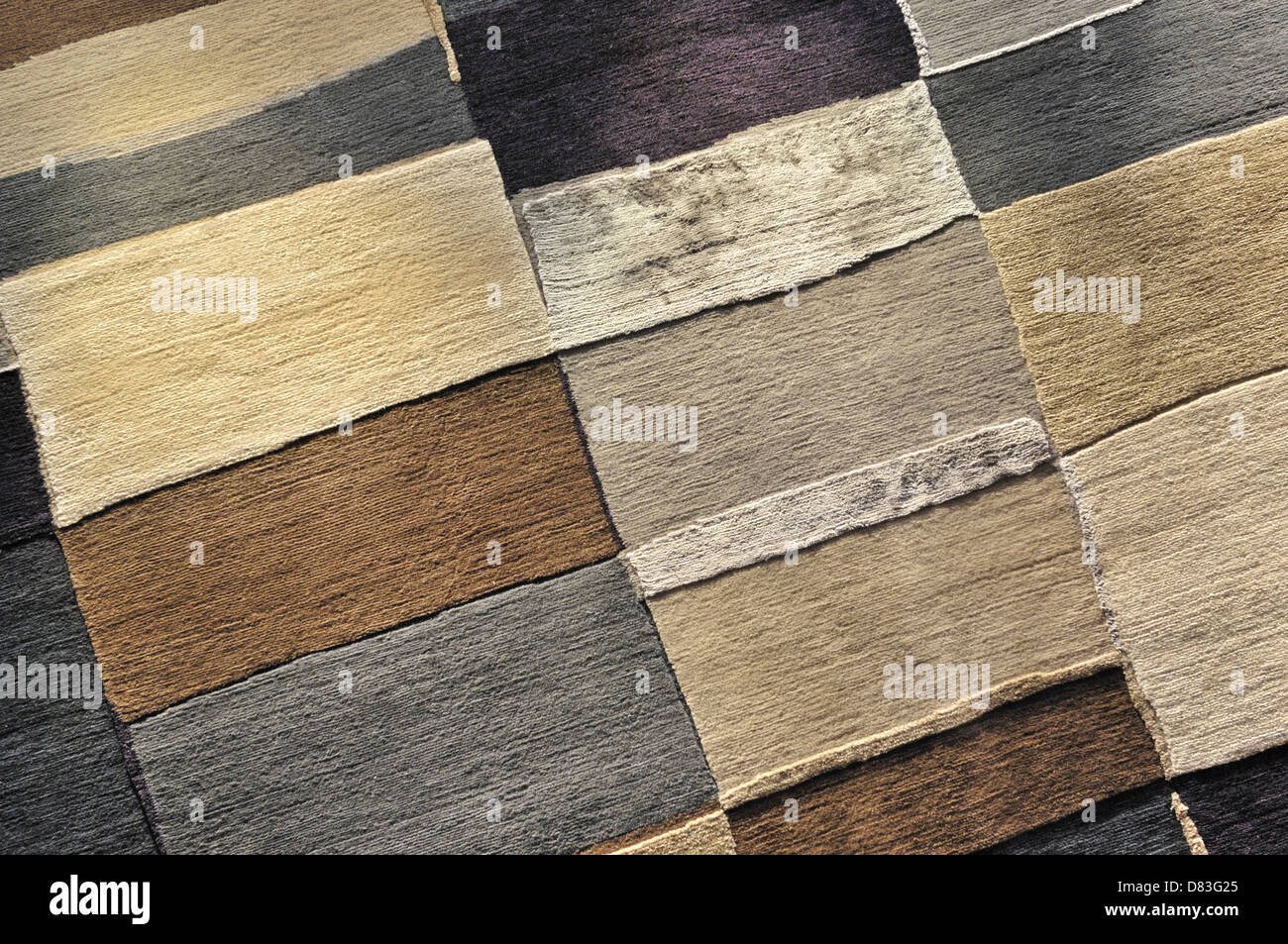 Surface covered with patches of different color carpeting Stock Photo ...