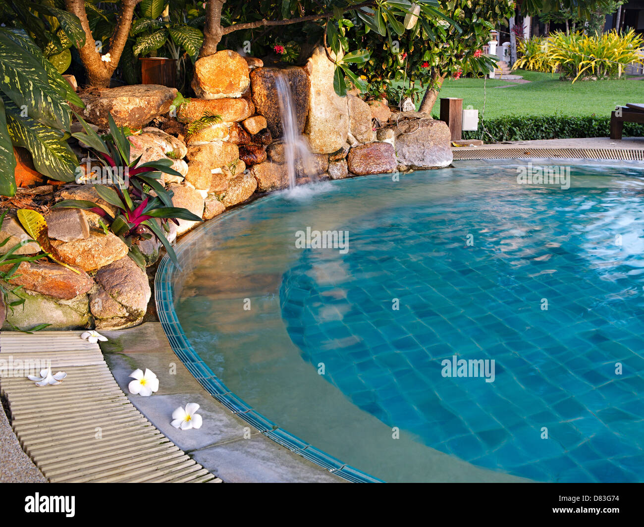 Swimming pool waterfall backyard hi-res stock photography and images ...