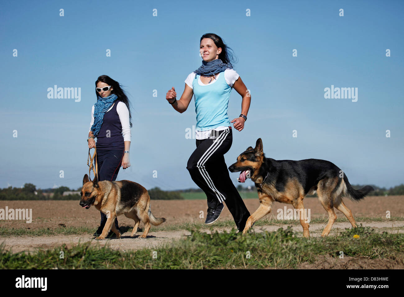 women with German Shepherd Stock Photo - Alamy
