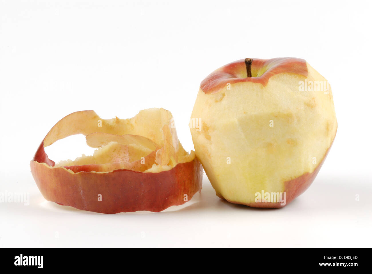 a peeled apple on white background Stock Photo - Alamy