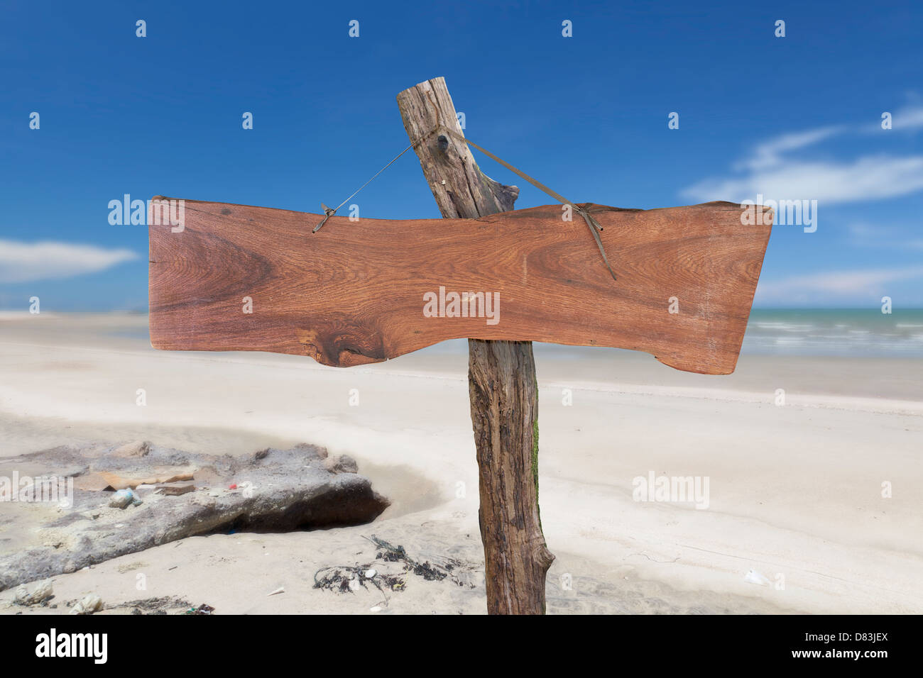 wooden signboard on tropical beach Stock Photo - Alamy