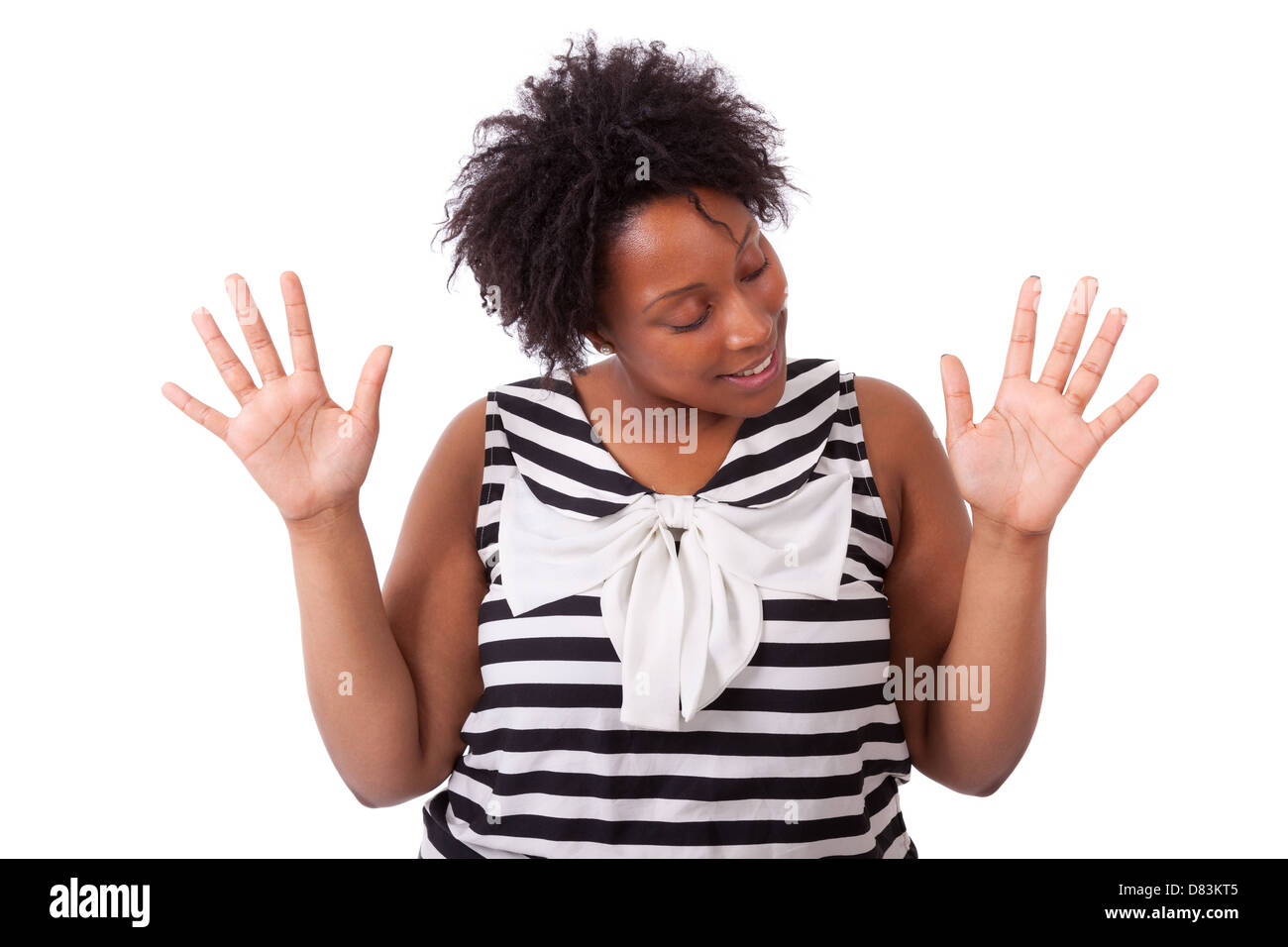 Young black woman showing her hands palm, isolated on white background ...