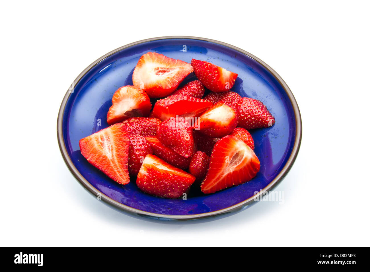 fresh sliced strawberries isolated on white background Stock Photo - Alamy