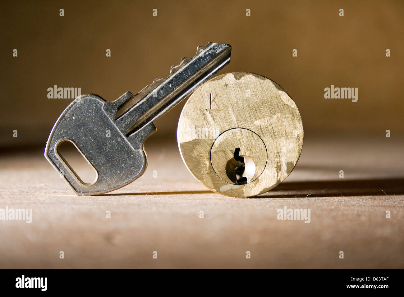 used cylinder lock with its key Stock Photo - Alamy