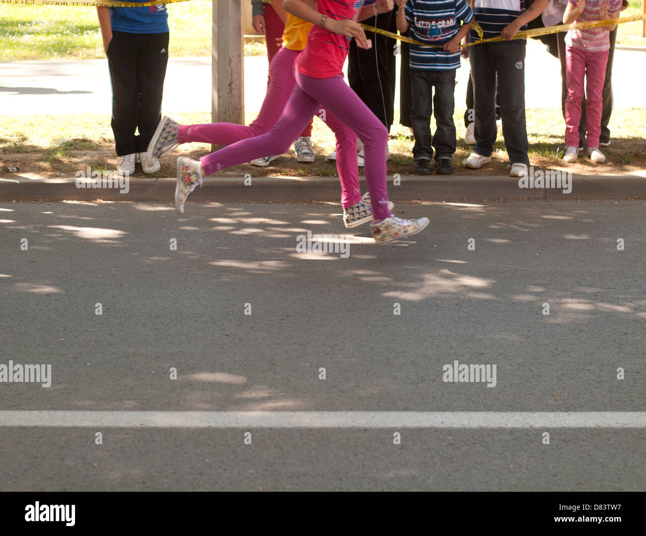 Two girls running hi-res stock photography and images - Alamy