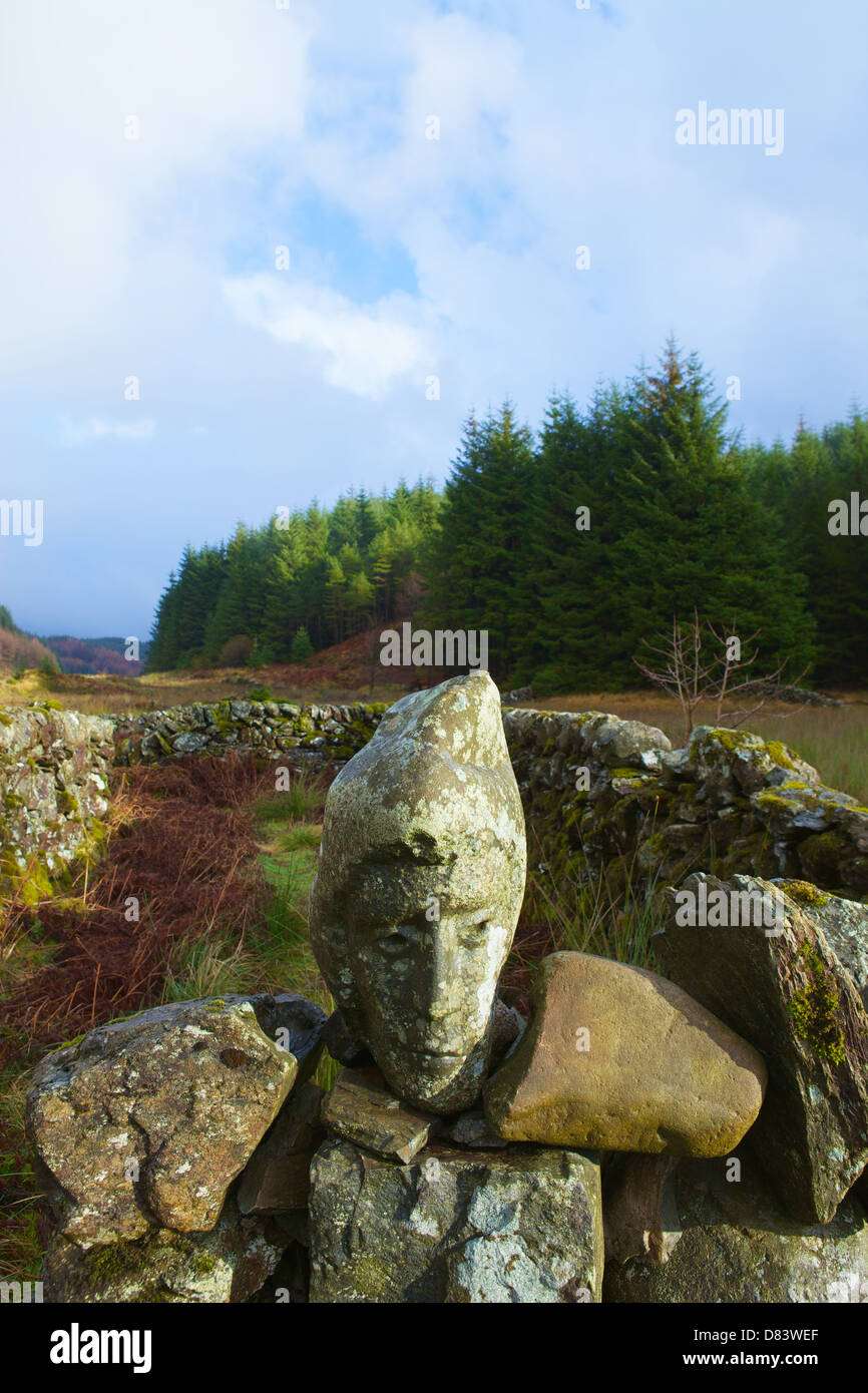 Stone sculpted human faces embedded in dry stone dykes, by Matt Baker ...