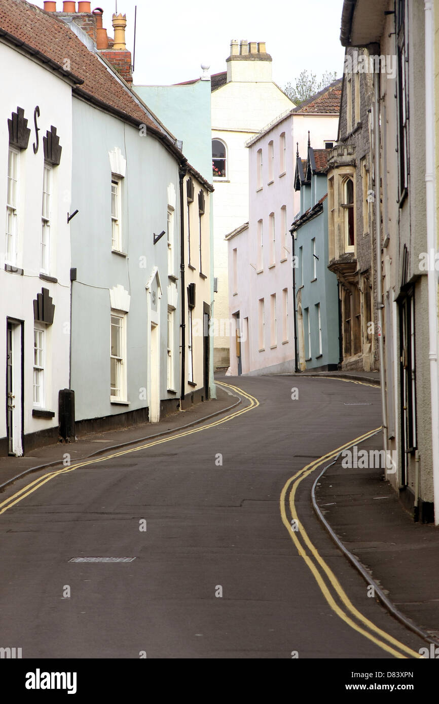 Narrow twisty street through the town of Axbridge on Somerset, UK, May ...