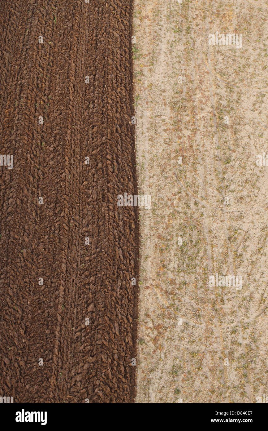 Agriculture arable farming ploughed land alongside fallow land Stock ...