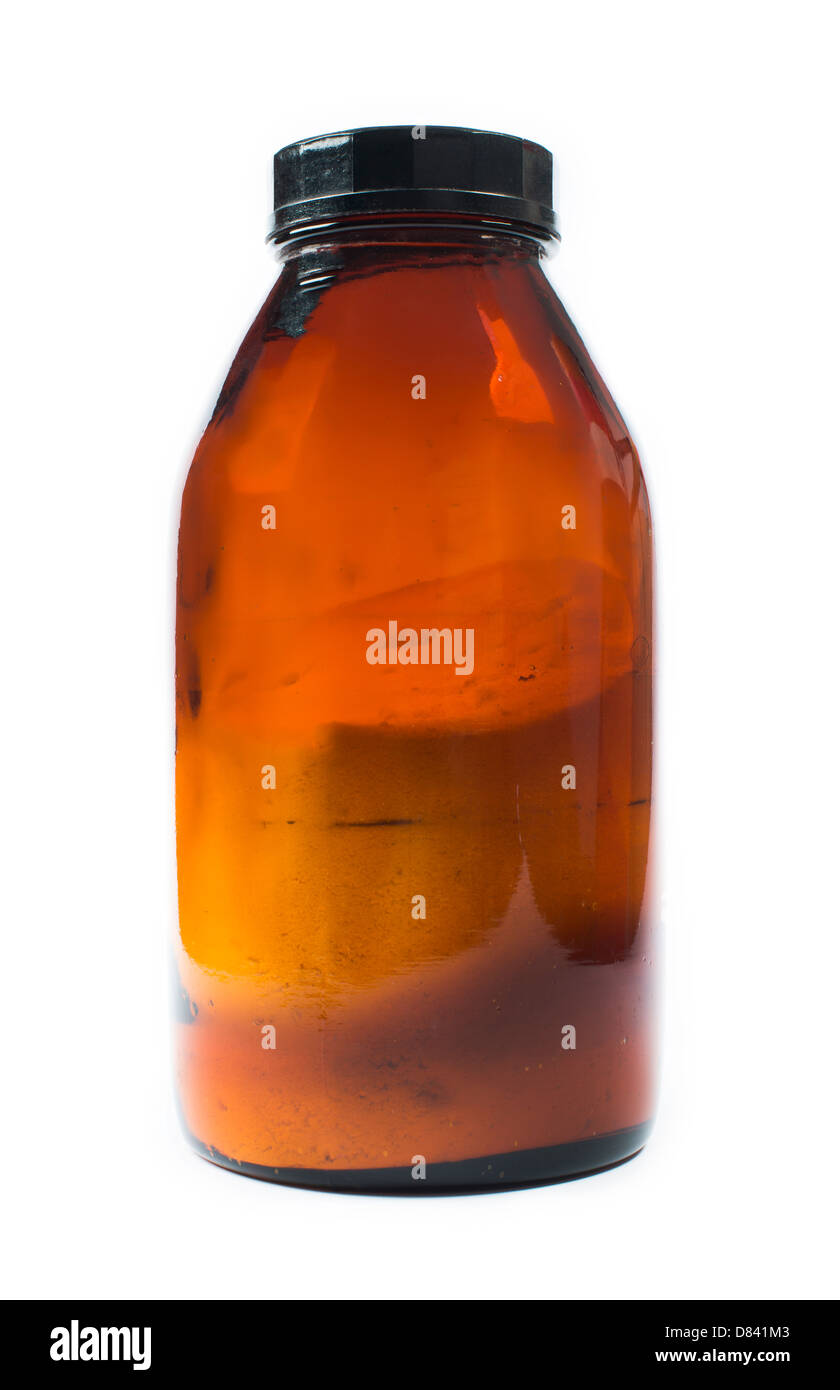 Dark transparent glass jars with chemicals Stock Photo - Alamy