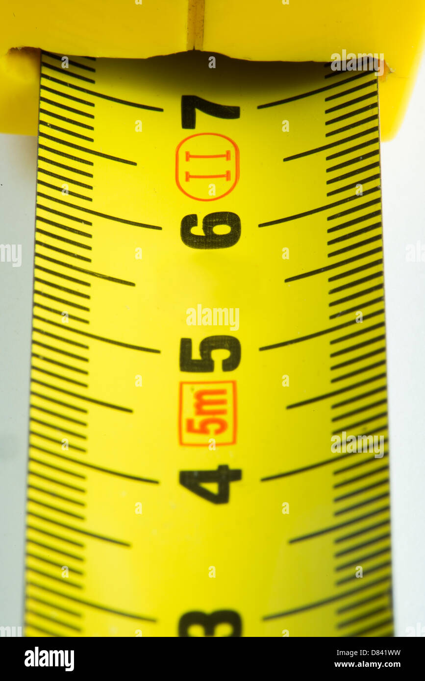 Yellow measuring tape Stock Photo - Alamy