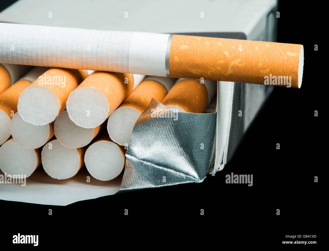 Box of cigarettes.Close up black isolated studio shot Stock Photo - Alamy