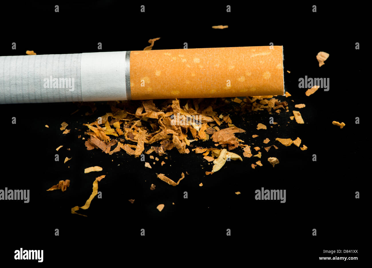 Crumpled cigarette and tabaco Stock Photo - Alamy