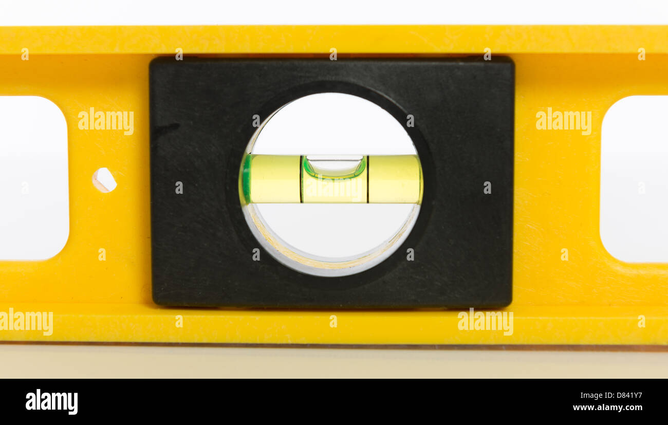 A yellow bubble level on a white background Stock Photo - Alamy