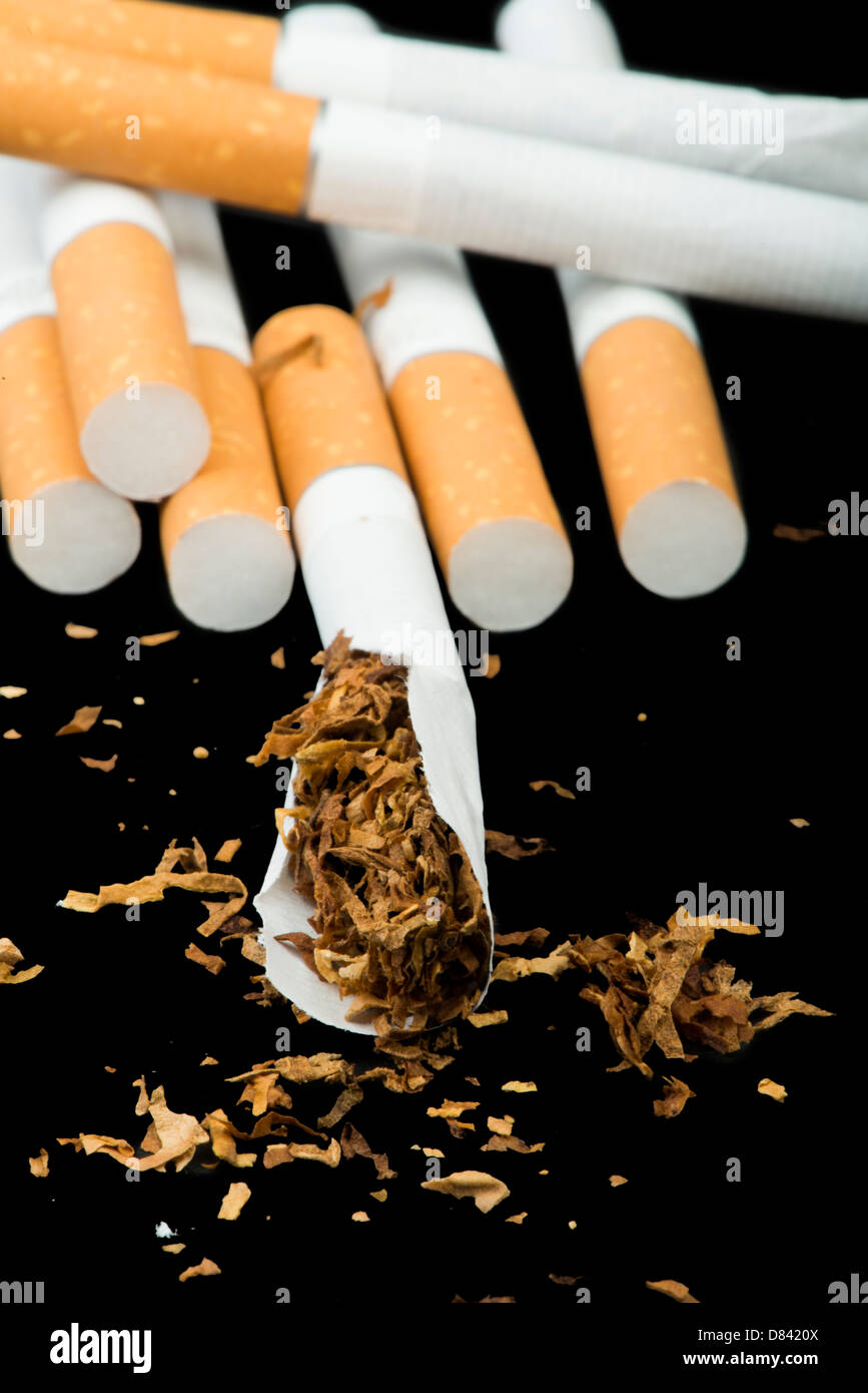Crumpled cigarette and tabaco Stock Photo - Alamy