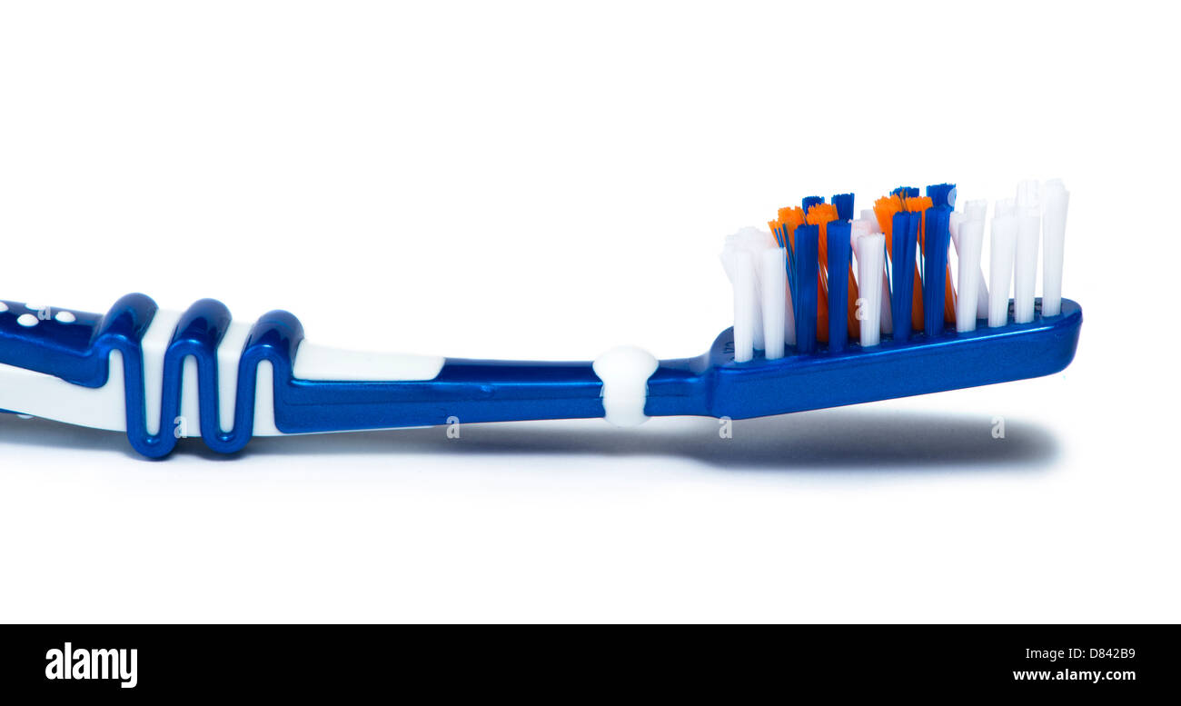 Blue toothbrush white isolated studio shot Stock Photo - Alamy