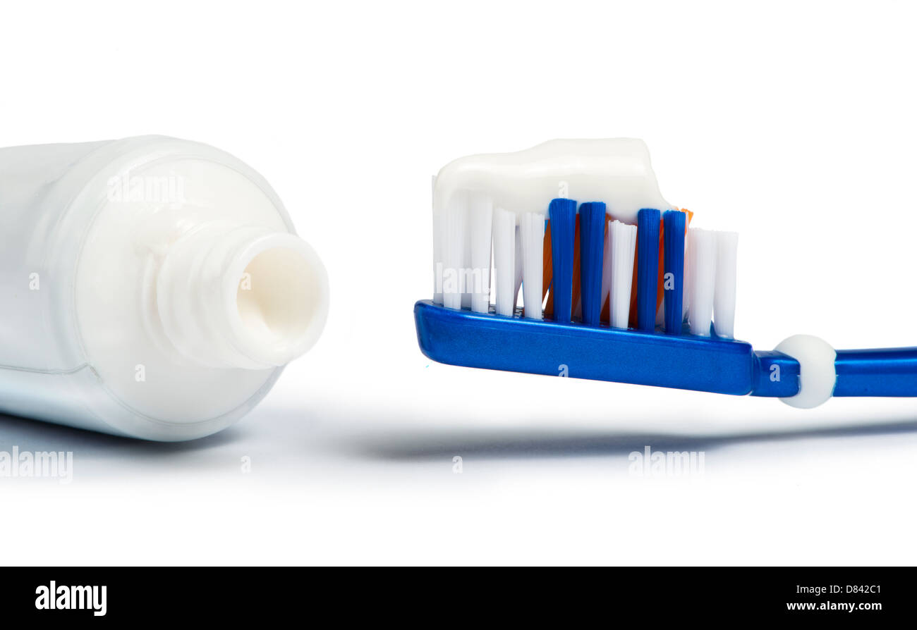 Blue toothbrush toothpaste white isolated studio shot Stock Photo - Alamy