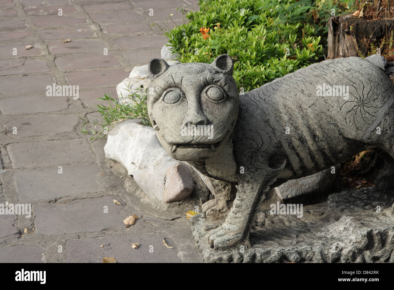 Old Chinese tiger statue at Wat Pho temple in Bangkok , Thailand Stock ...