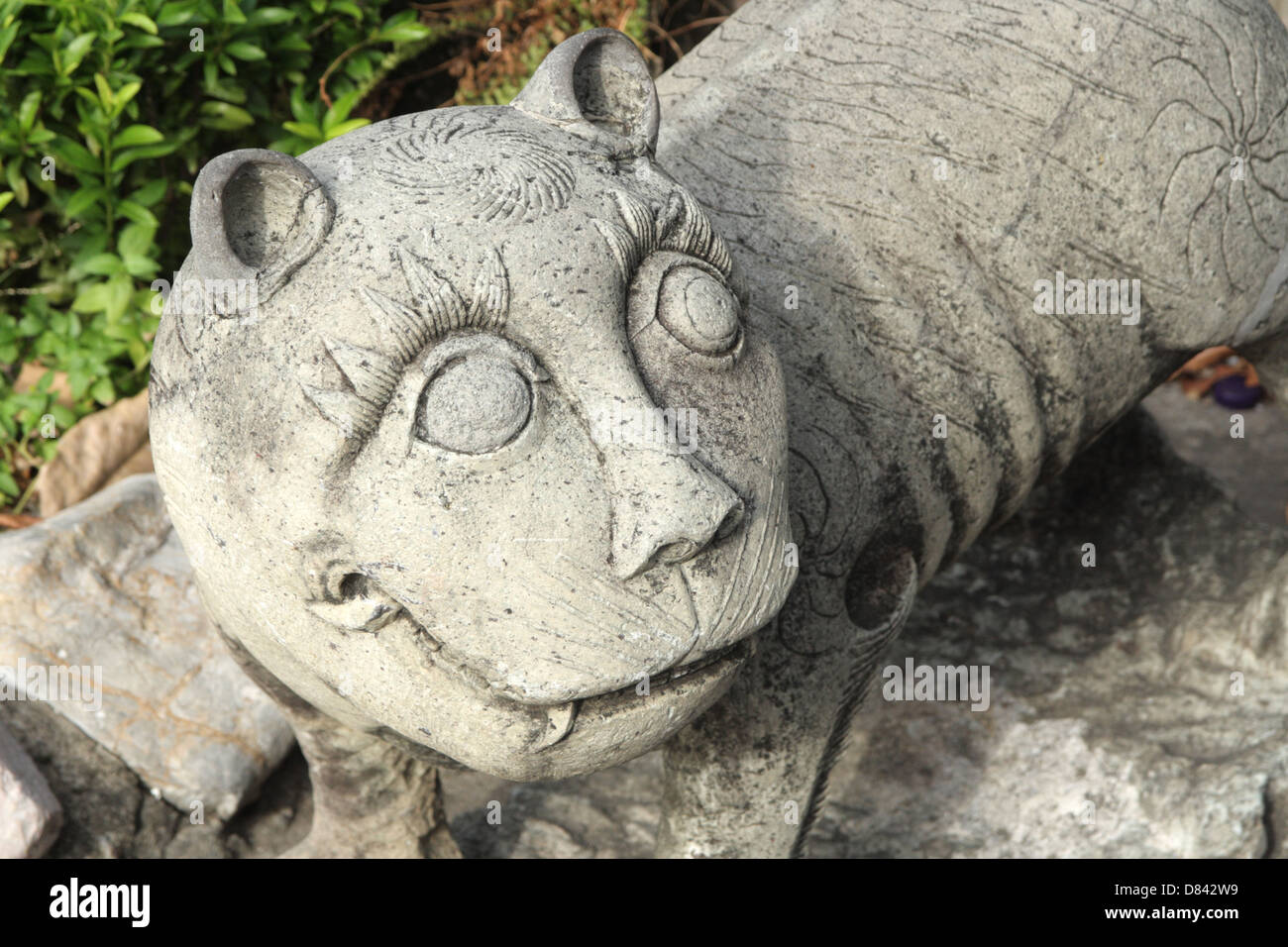 Old Chinese tiger statue at Wat Pho temple in Bangkok , Thailand Stock ...