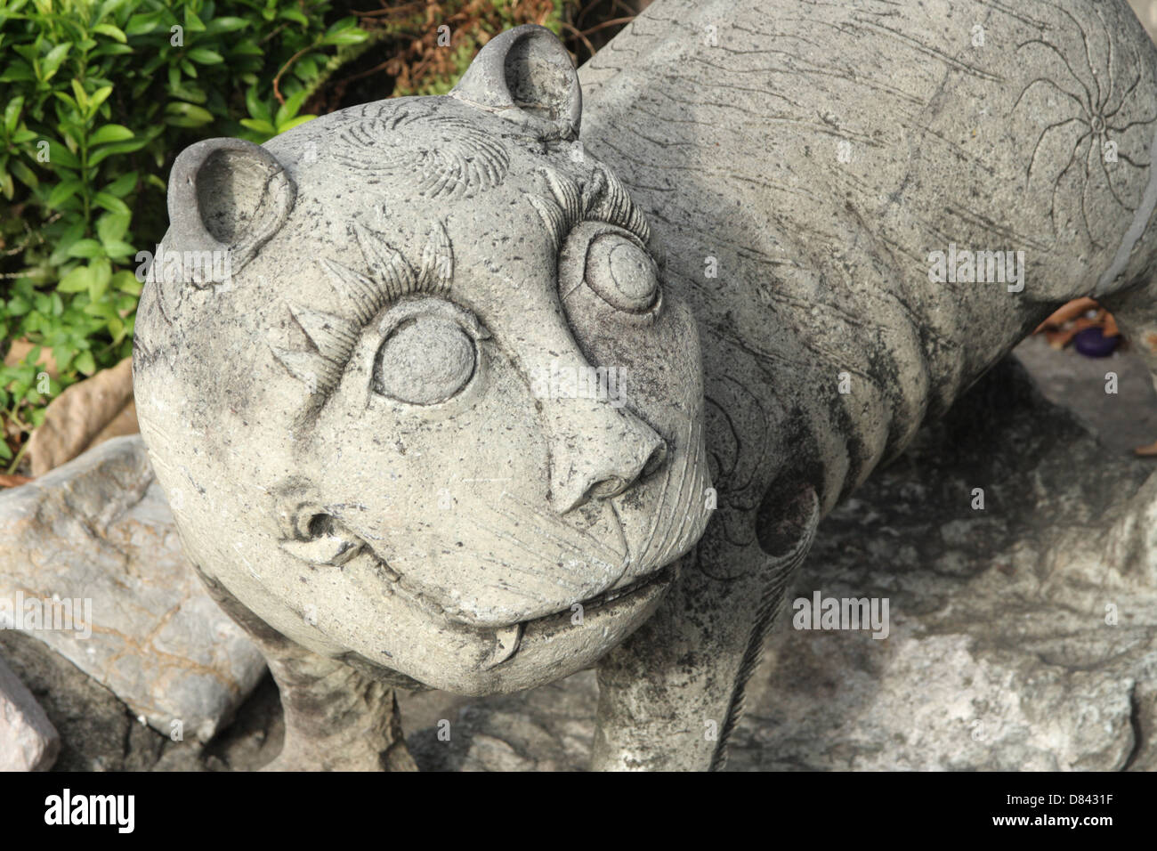 Old Chinese tiger statue at Wat Pho temple in Bangkok , Thailand Stock ...