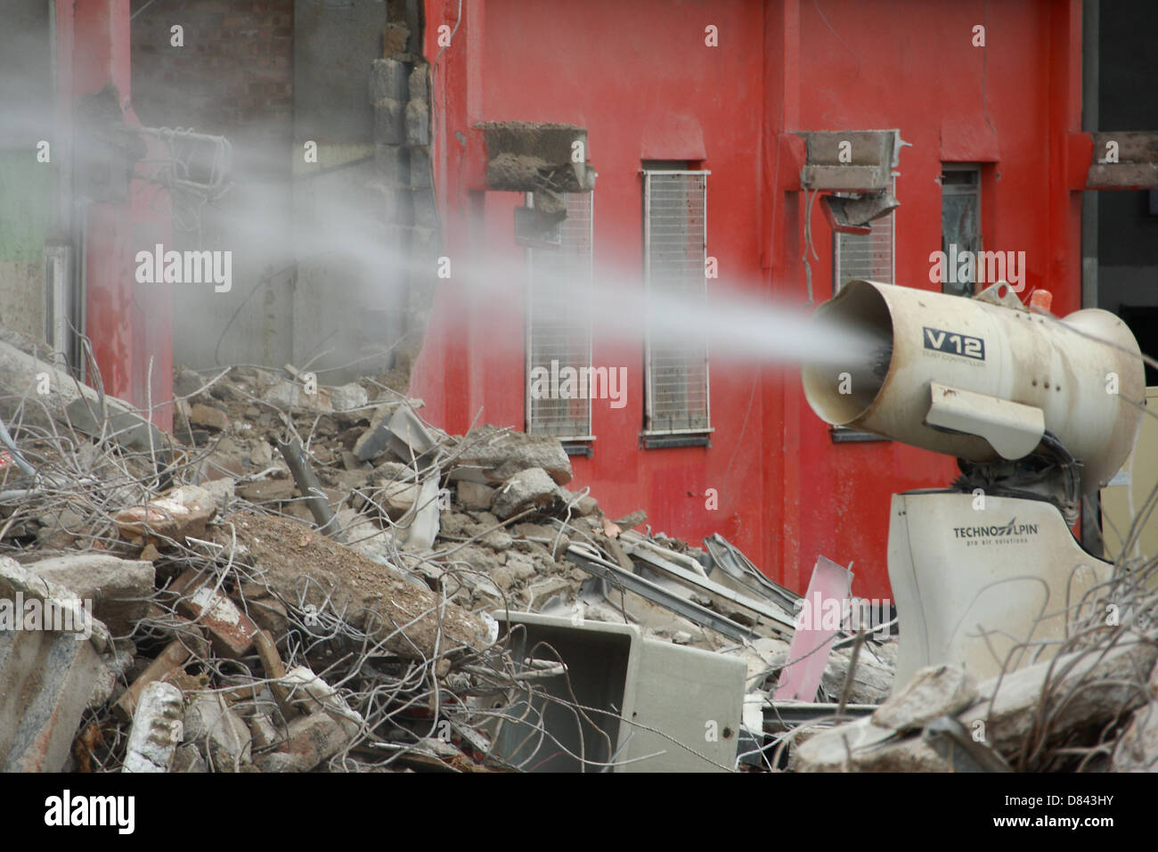 dust suppression unit working on a demolition project Stock Photo - Alamy