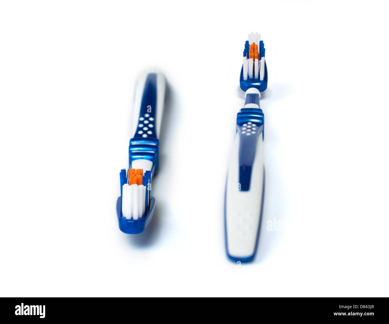 Blue toothbrush white isolated studio shot Stock Photo - Alamy