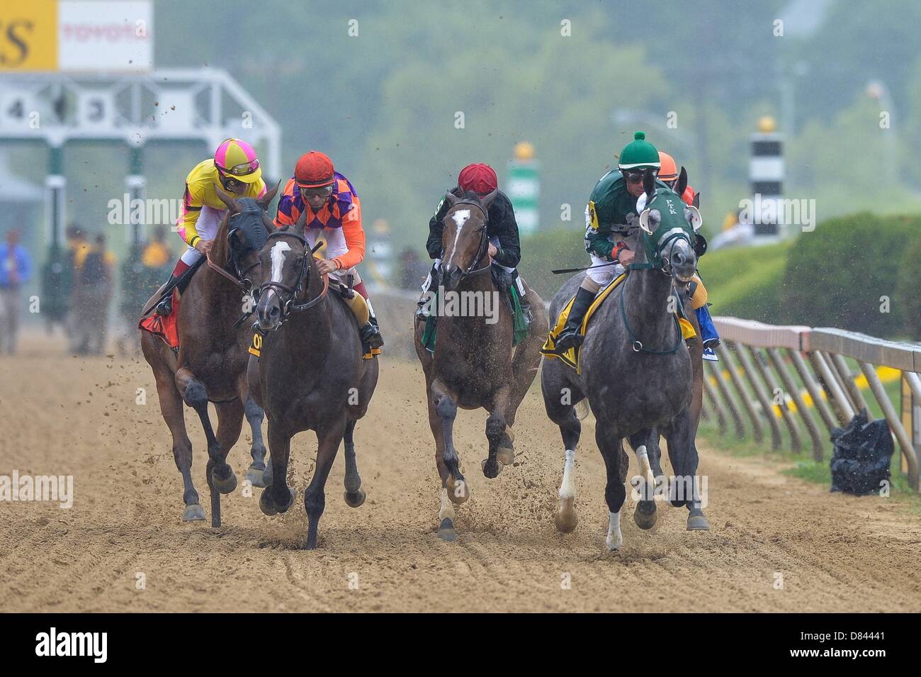 Baltimore, USA. 18th May, 2013. The horses race down the strait away ...