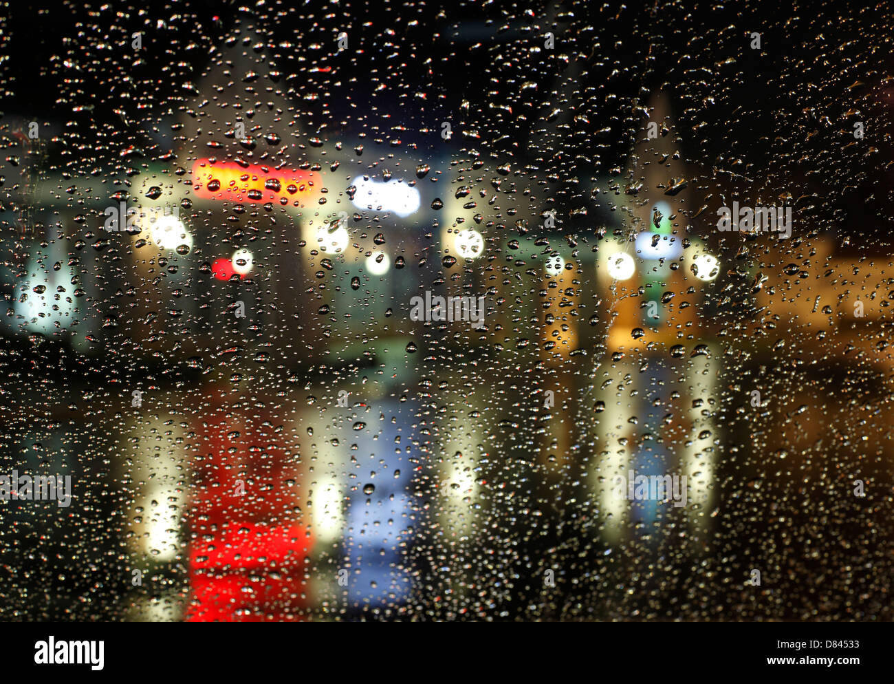 Rain drops on windshield with neon lights Stock Photo - Alamy
