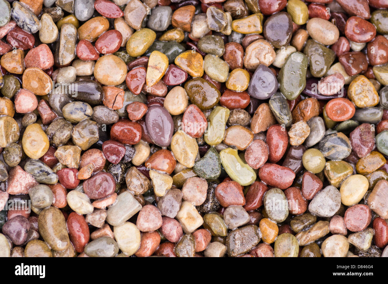 Shiny stones or pebbles for use as a background or texture Stock Photo ...
