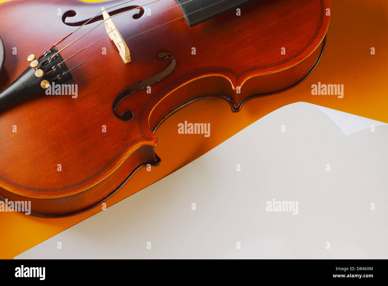 violin and bow with white note paper on yellow background Stock Photo ...