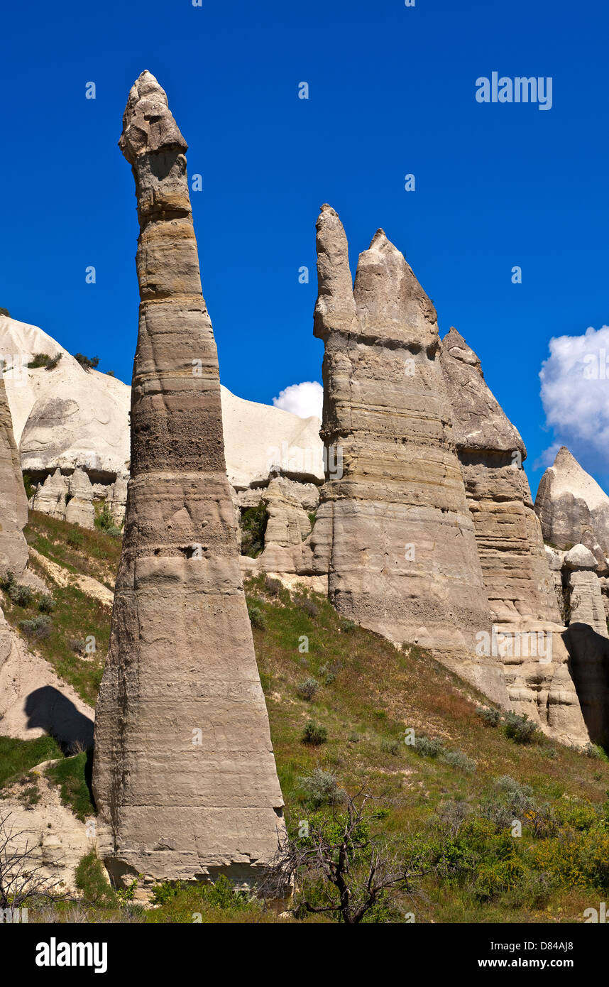 Tuff rock formations or fairy chimneys in the Love Valley near Uchisar ...