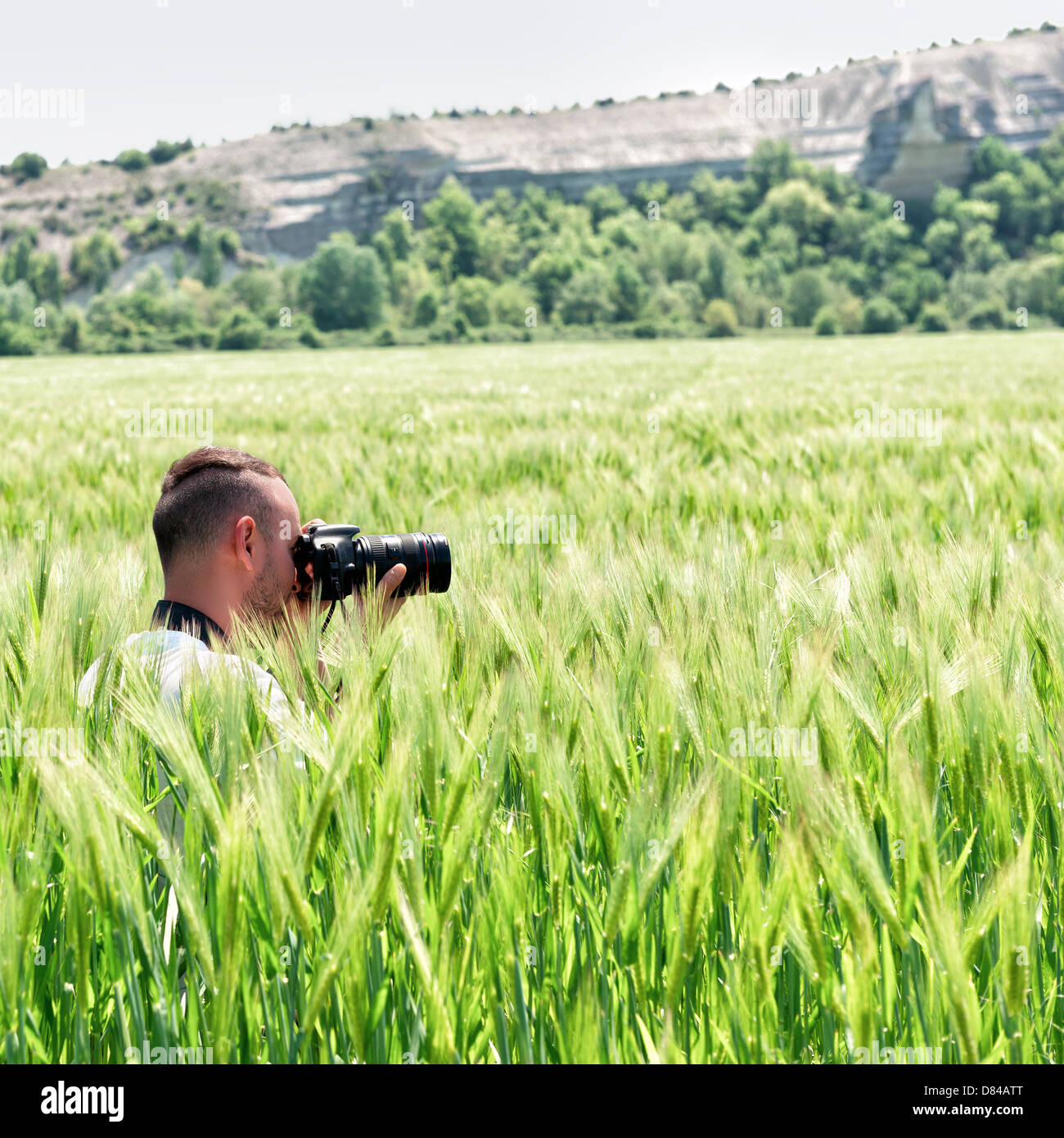 Men take a photo about beautiful landscape Stock Photo - Alamy