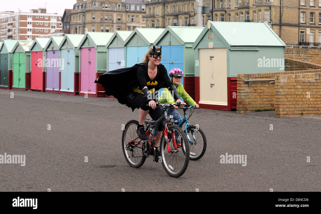 Hove, Sussex UK. 19th May 2013. A runner arrives as hundreds of people ...