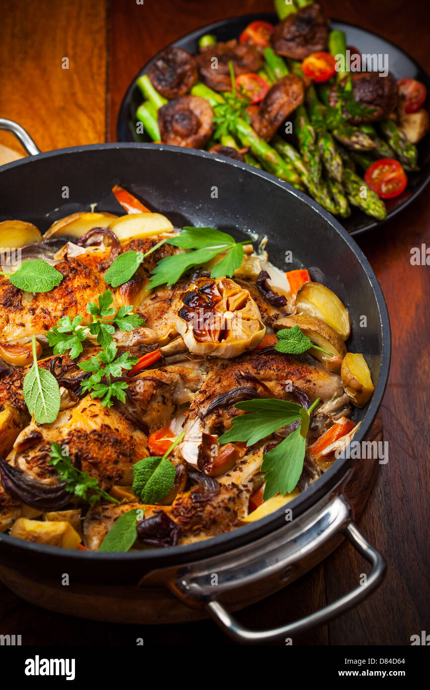 Roasted roasted rabbit on vegetables Stock Photo - Alamy