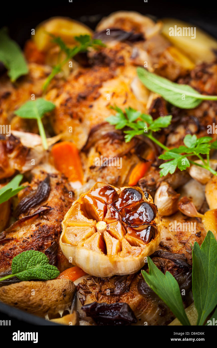 Roasted roasted rabbit on vegetables Stock Photo - Alamy