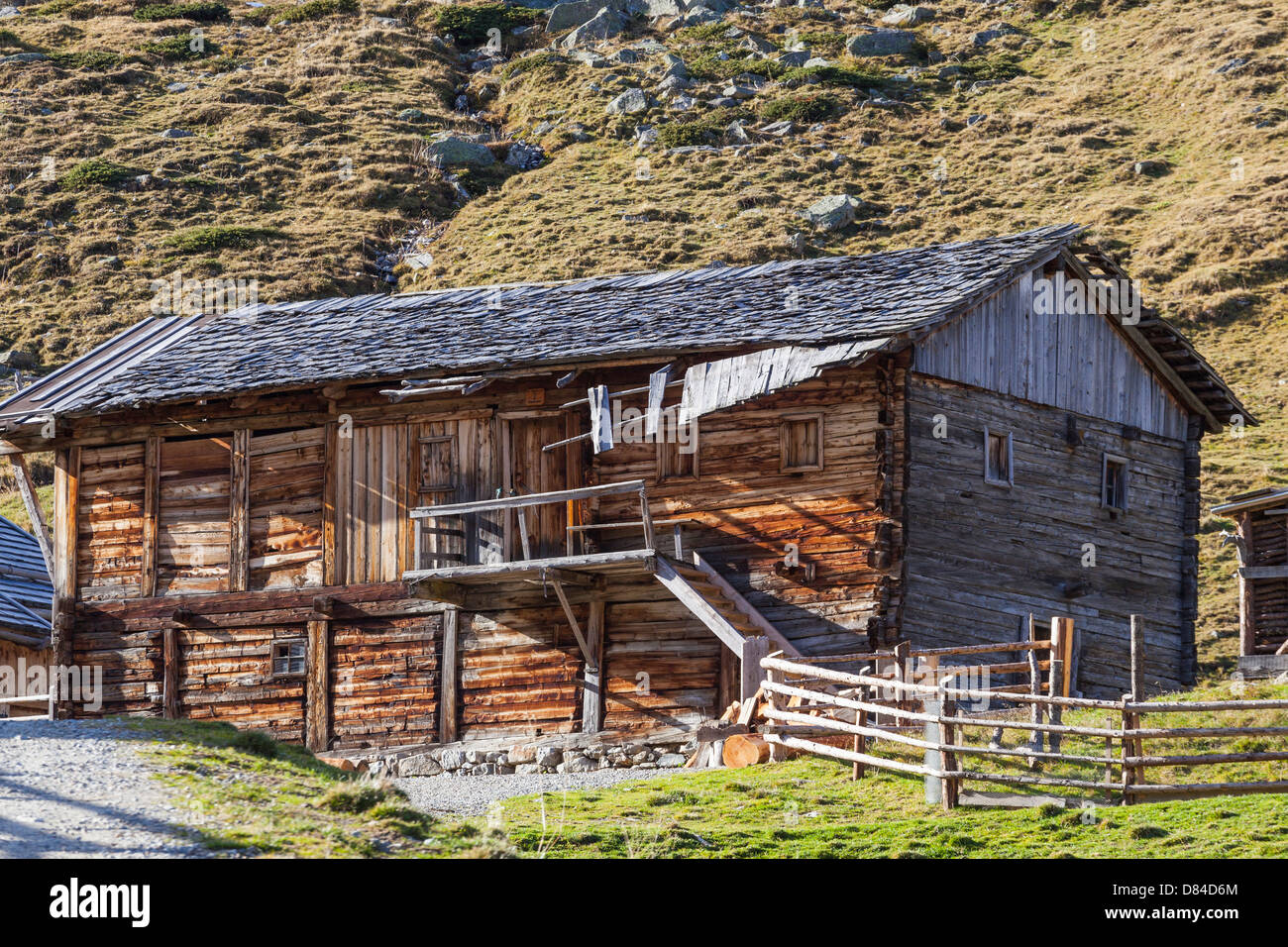 Old weathered farm houses in the alp Tirol Stock Photo - Alamy
