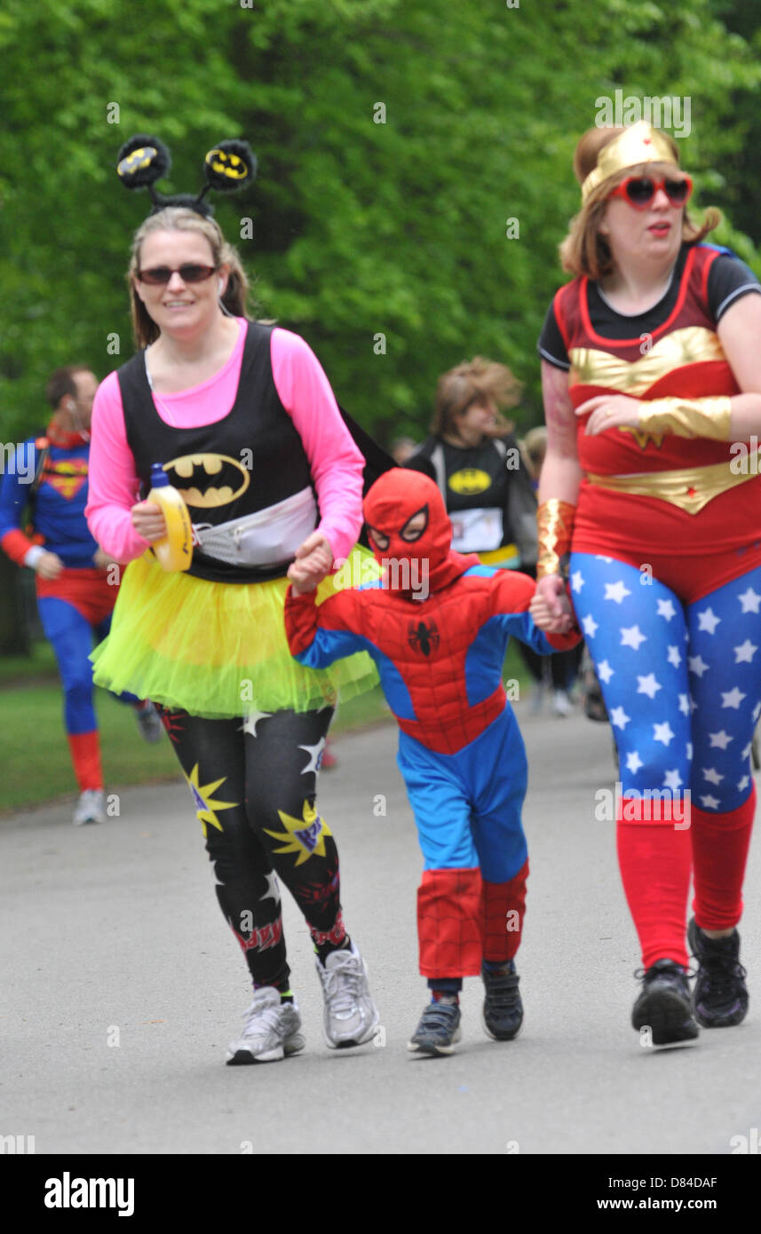 Regents Park, London, UK. 19th May 2013. Superheroes running the race ...