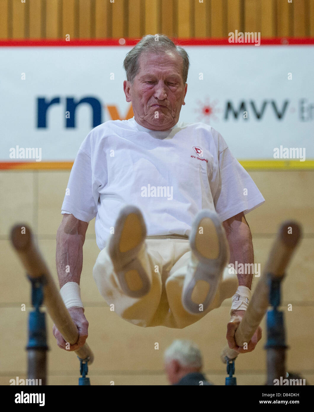 Participant of the German Gymnastics Festival performs an exercise ...