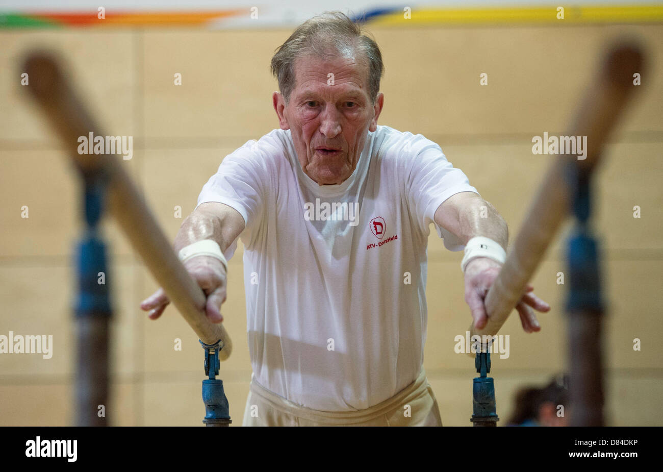 Participant of the German Gymnastics Festival performs an exercise ...