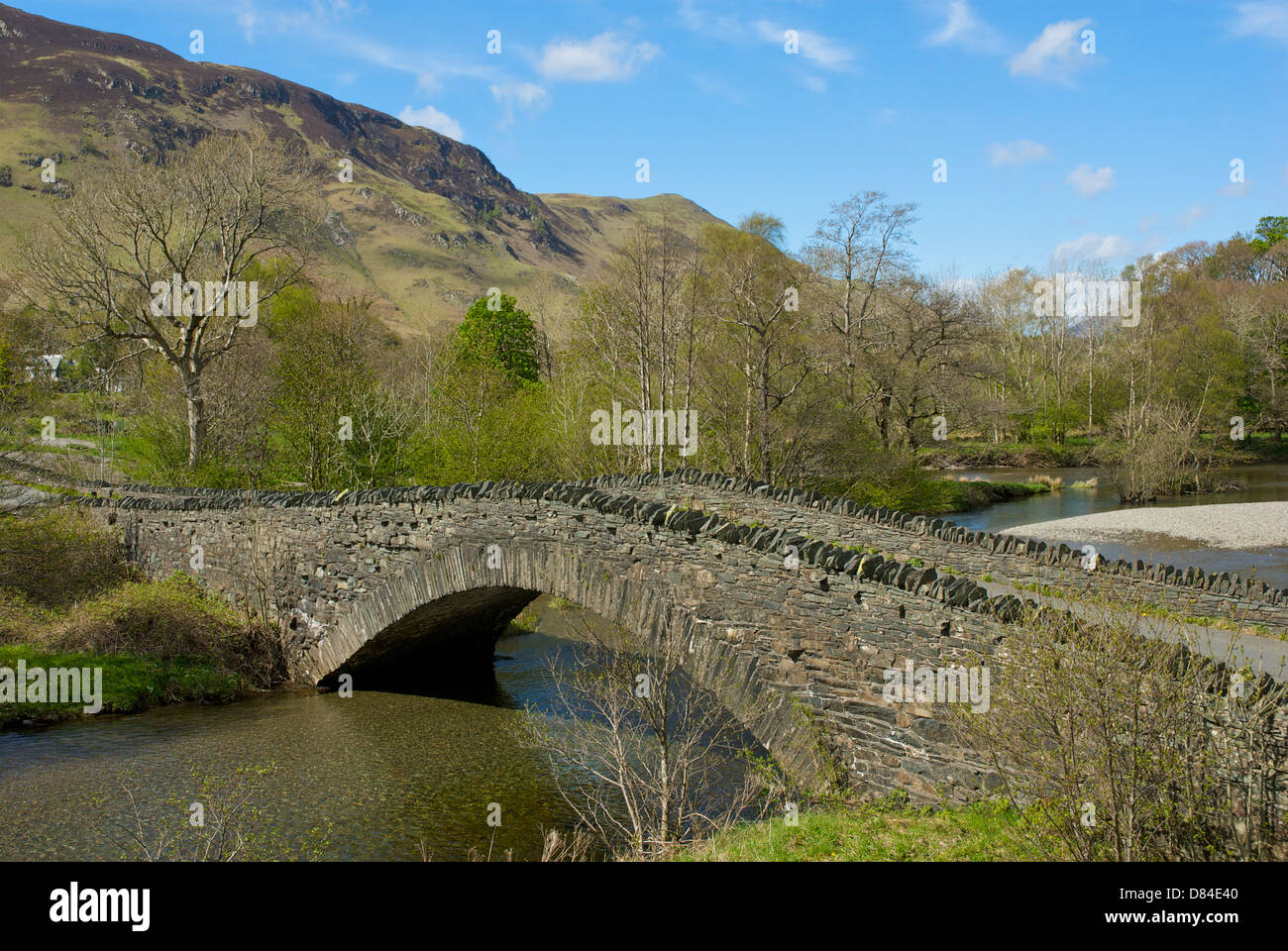 Old stone bridge over the River Derwent at the village of Grange ...