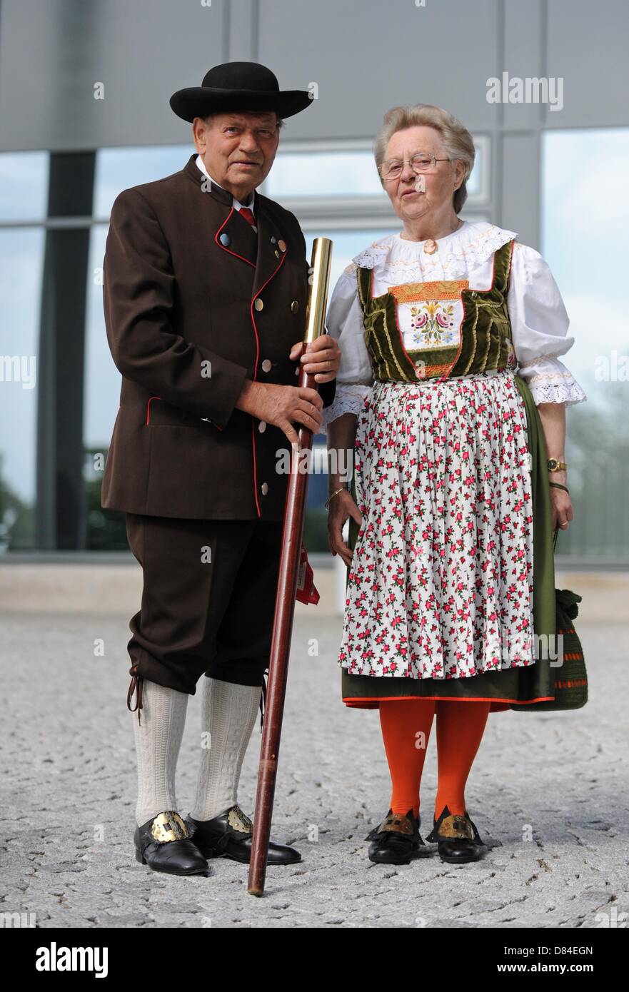 Couple in traditional costumes of Sudeten Germans stands in front of ...