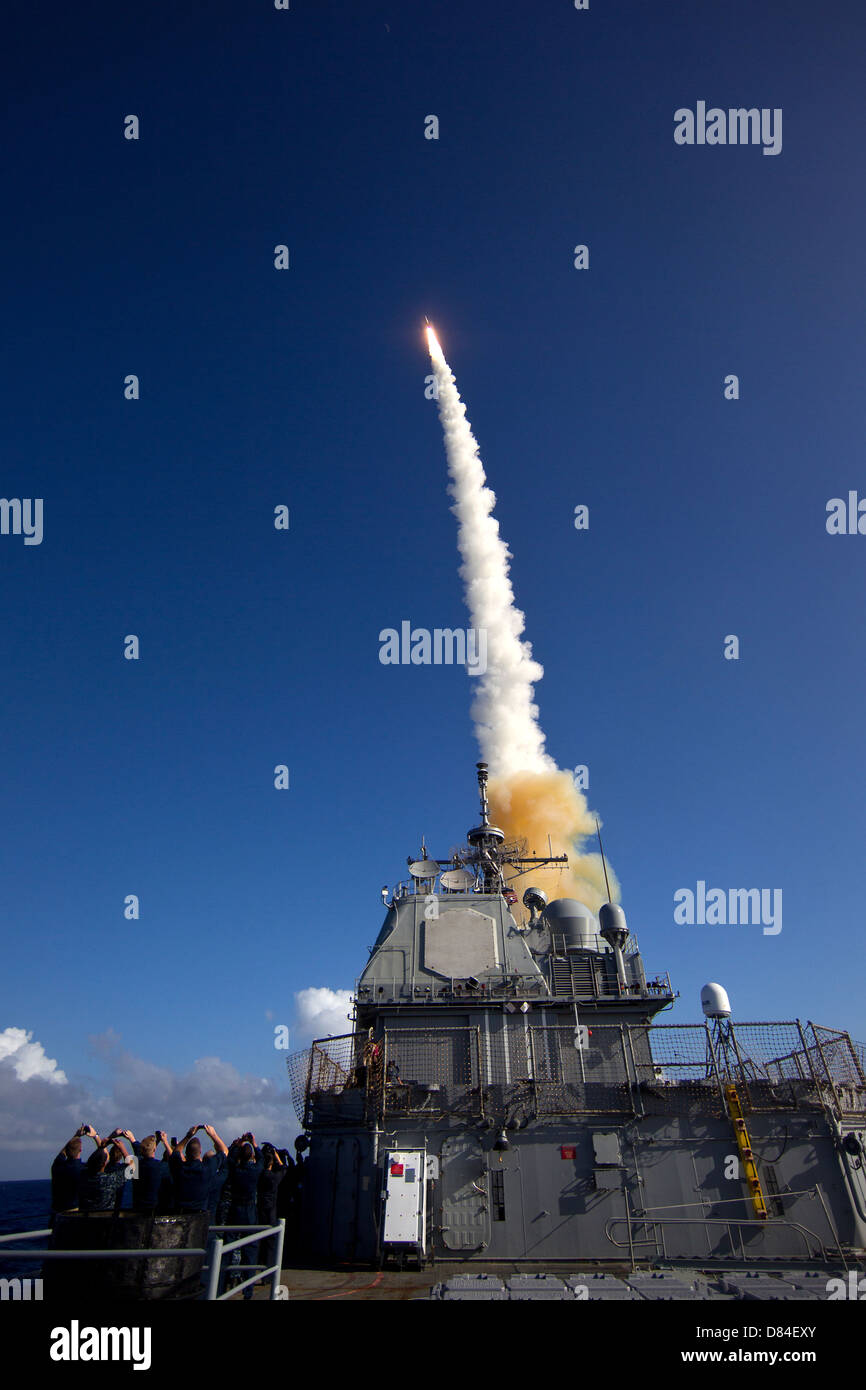 The US Navy guided-missile cruiser USS Lake Erie fires a A Standard ...
