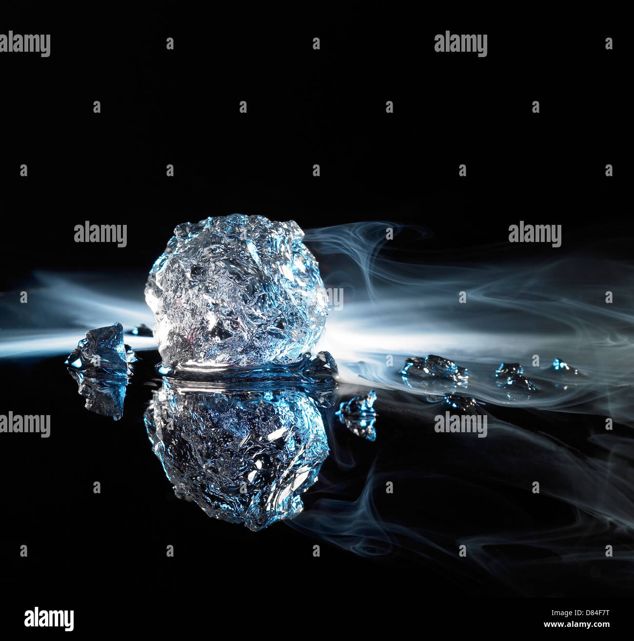 Ice cube melting smoke hi-res stock photography and images - Alamy