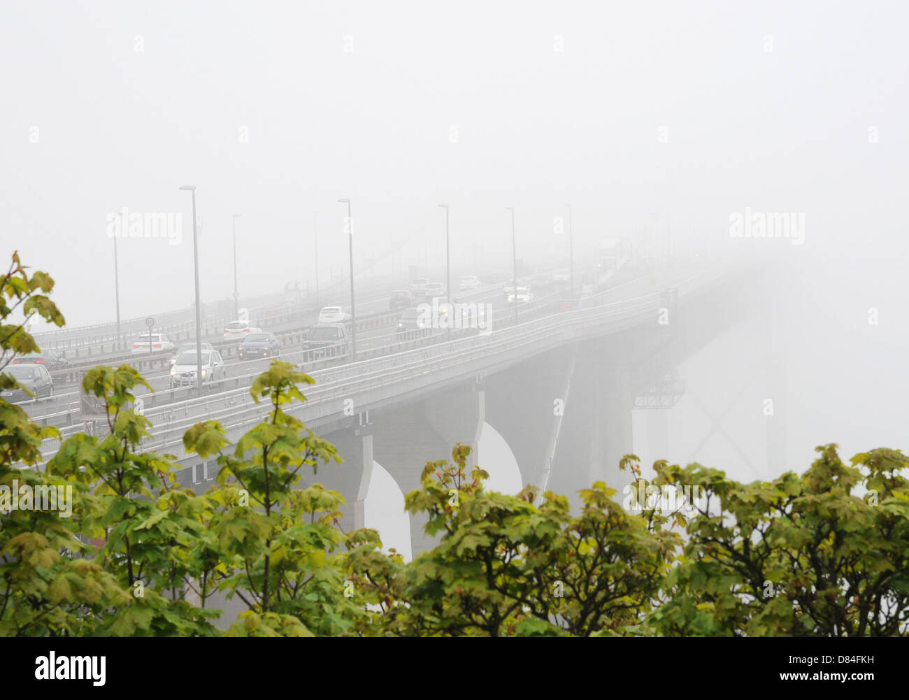 The Forth Bridge disappearing into the fog Stock Photo - Alamy